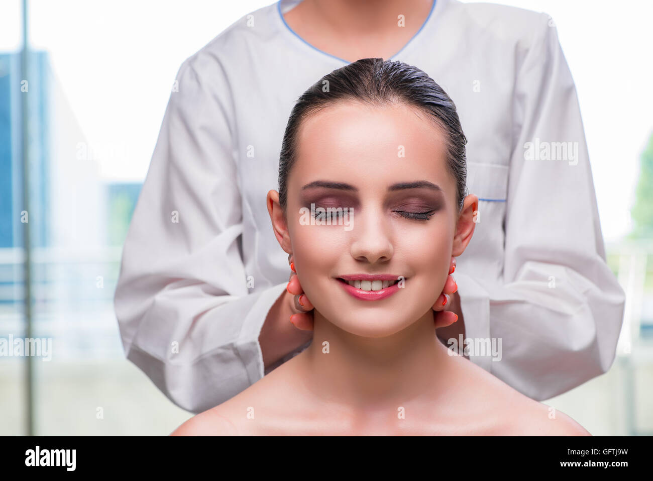 Young woman during face and skin massage session Stock Photo - Alamy