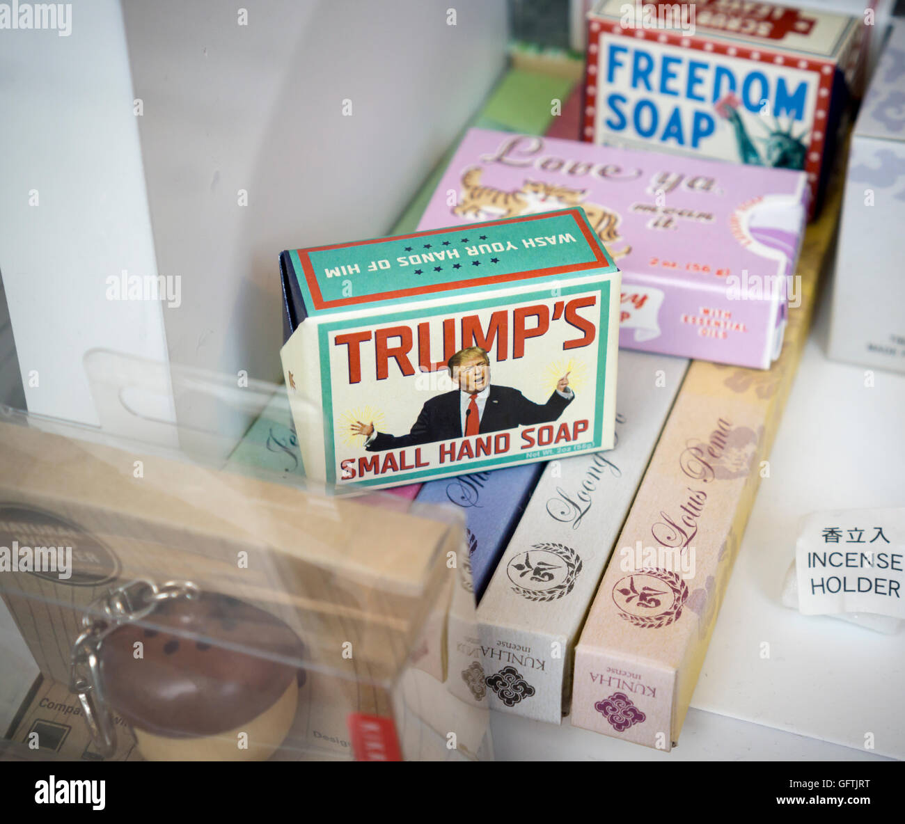 Donald Trump soap amidst other novelty products on display in a window ...