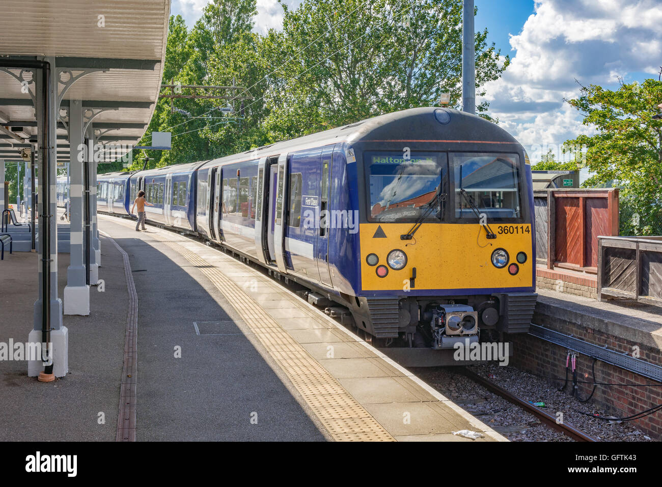 A four car Desiro 360 EMU service at Walton-on-the-Naze about to depart ...
