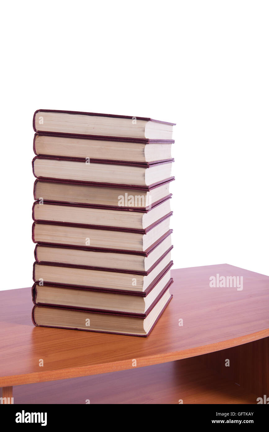 Stack of books arranged the office desk Stock Photo - Alamy