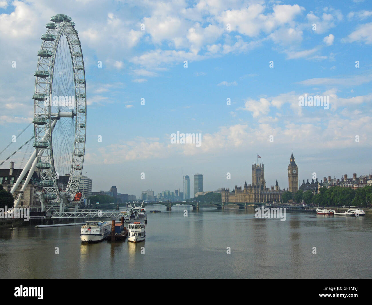 View of the London Eye and House of Commons from Waterloo Bridge ...