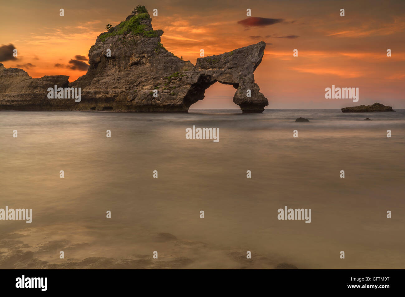 rock stone in ocean Stock Photo - Alamy