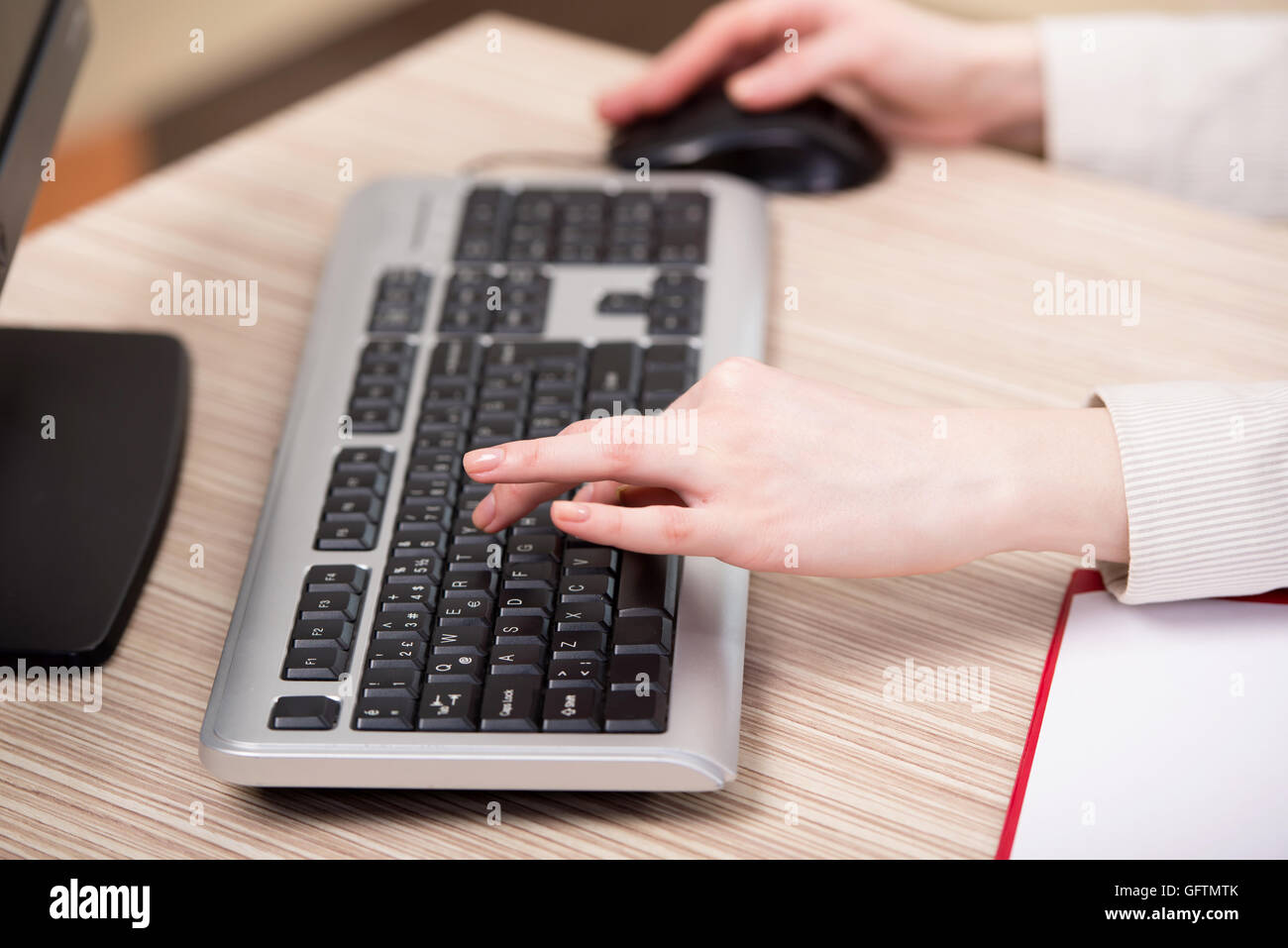 Hands working on the keyboard in the office Stock Photo - Alamy