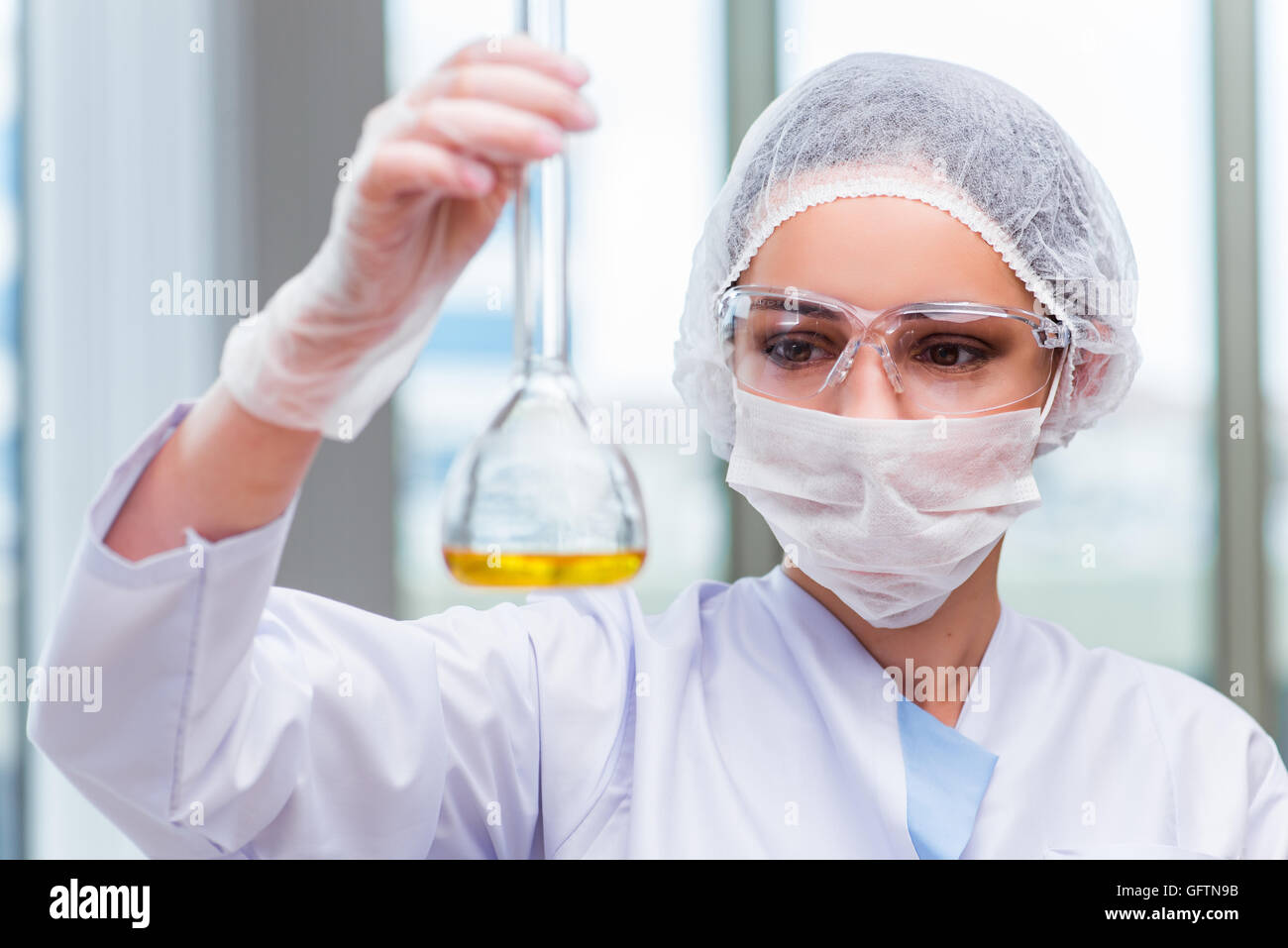 Young student working with chemical solutions in lab Stock Photo - Alamy