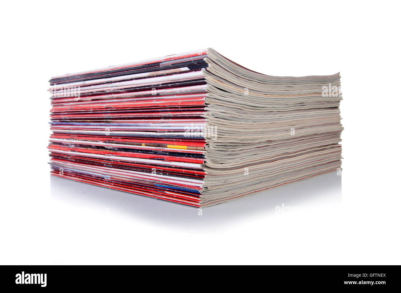 Stack of magazine isolated on the white background Stock Photo - Alamy