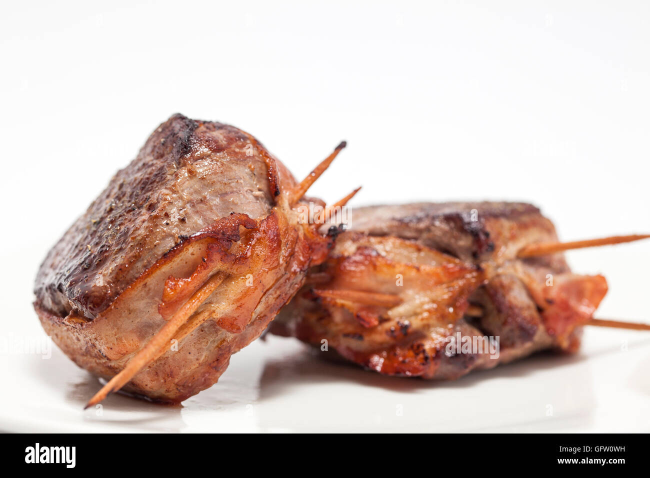 Filet Mignon cooked still with the toothpicks Stock Photo - Alamy
