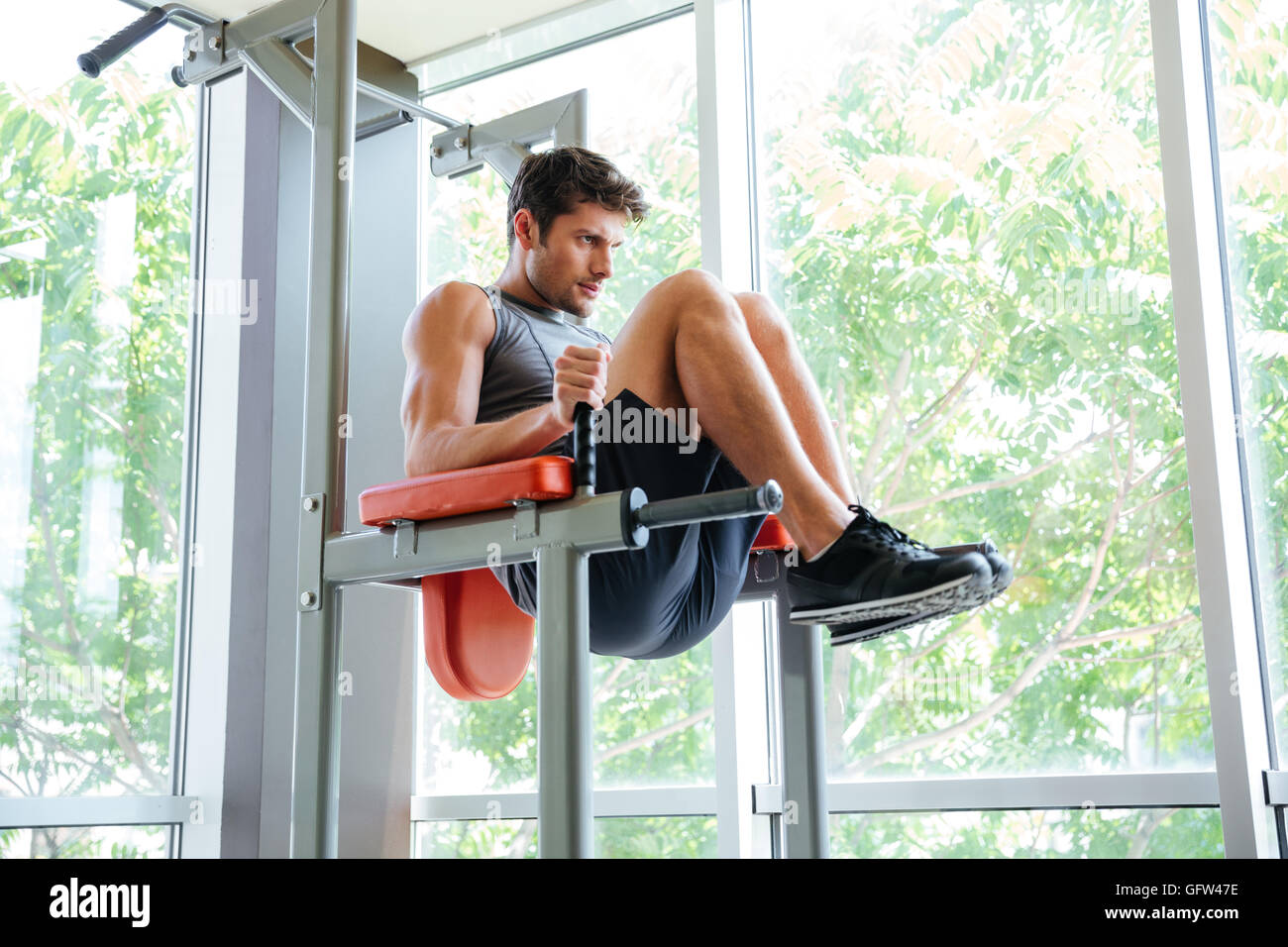 Handsome men exercising in gym hi-res stock photography and images - Alamy
