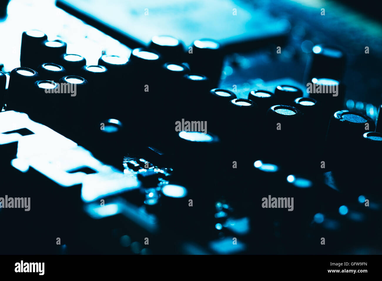 computer motherboard in blue dark background close-up Stock Photo - Alamy