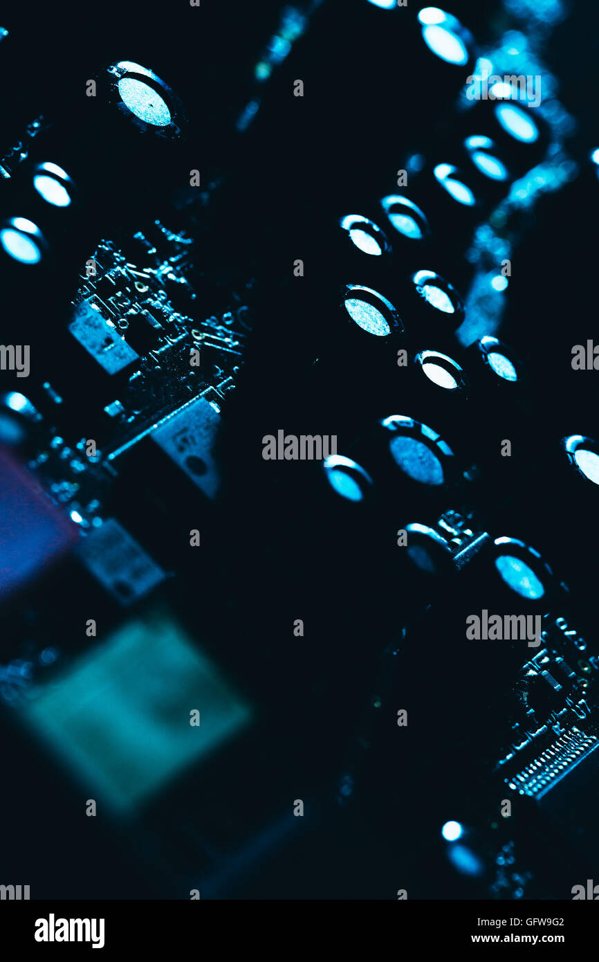 computer motherboard in blue dark background close-up Stock Photo - Alamy