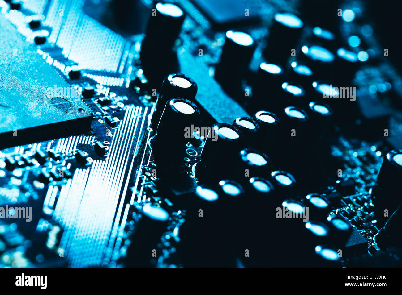 computer motherboard in blue dark background close-up Stock Photo - Alamy