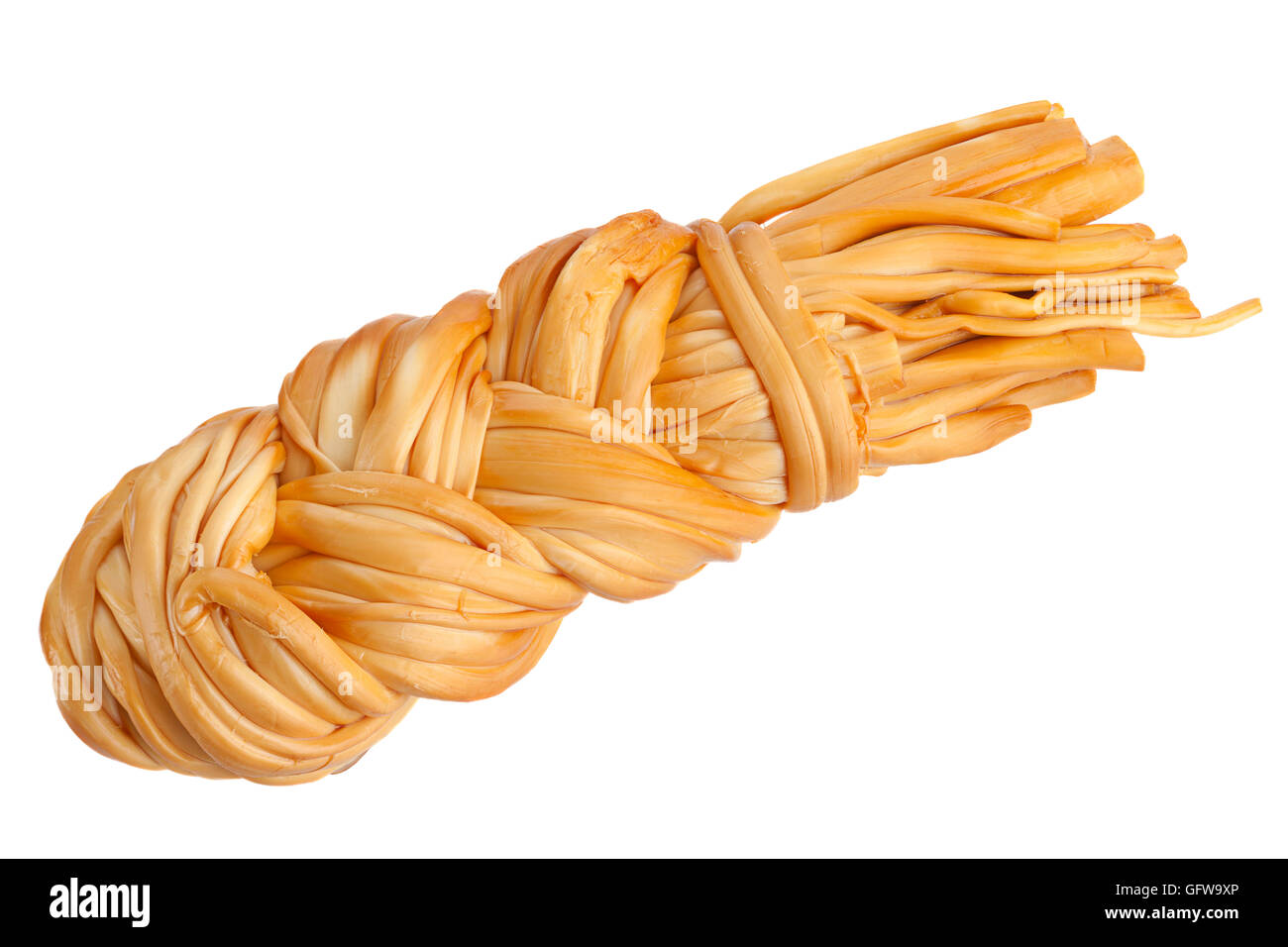 Smoked braided cheese isolated on white background Stock Photo - Alamy