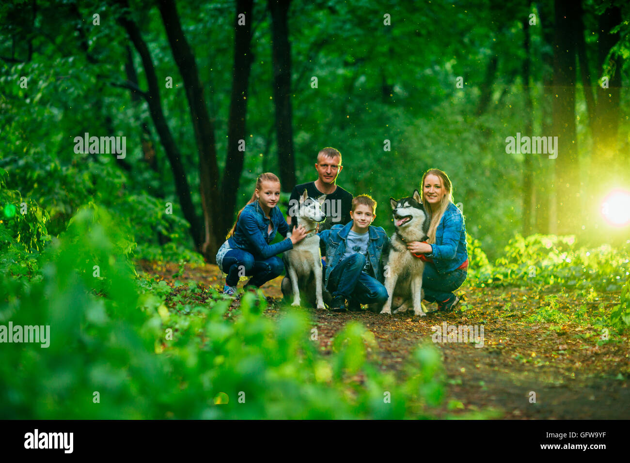 Children playing husky dog hi-res stock photography and images - Alamy