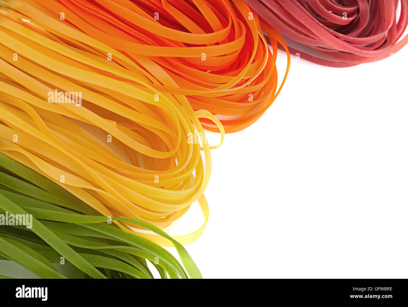 Wheat multicolored noodles isolated on white background Stock Photo - Alamy
