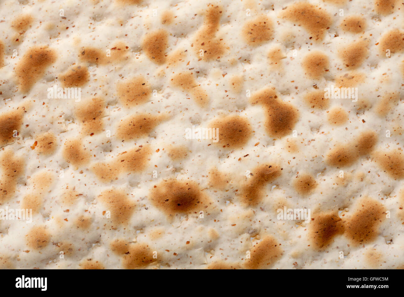 Matzo traditional jewish bread closeup background Stock Photo - Alamy