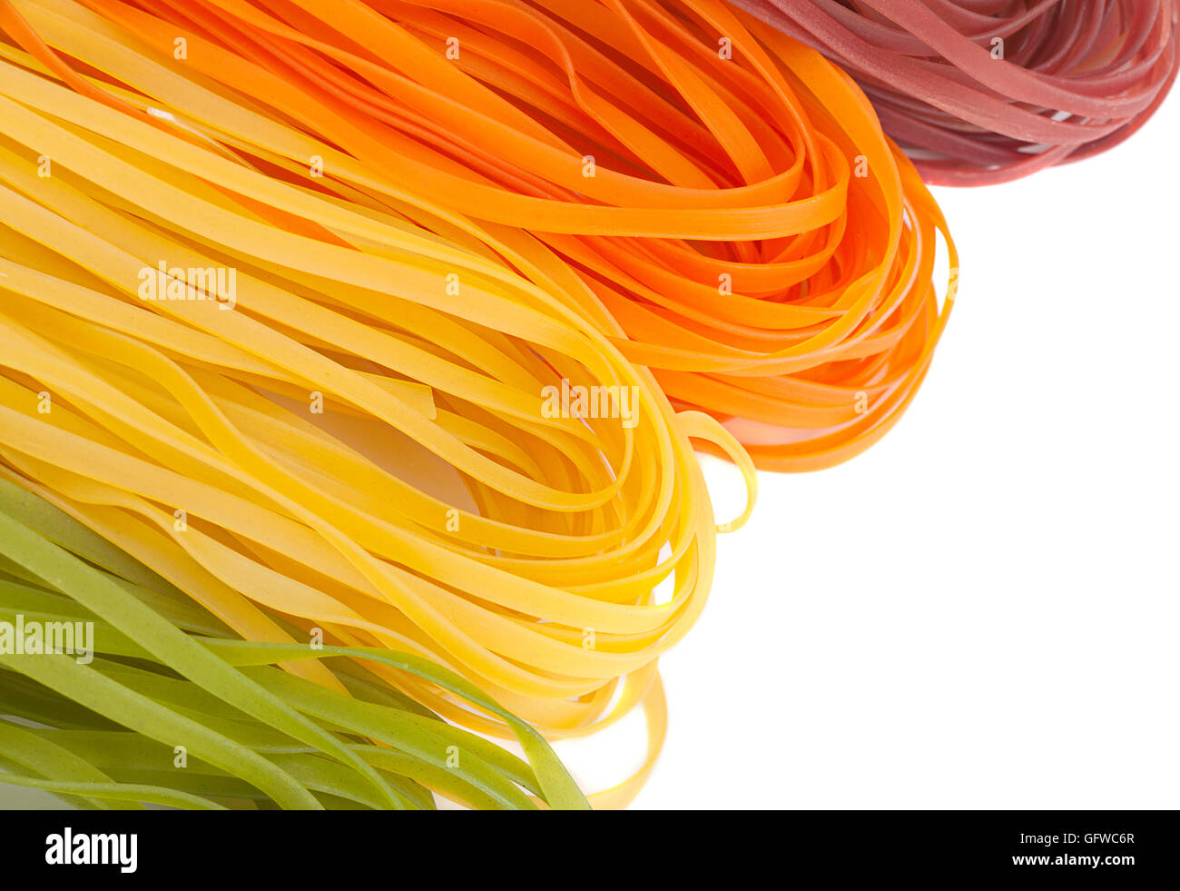 Wheat multicolored noodles isolated on white background Stock Photo - Alamy