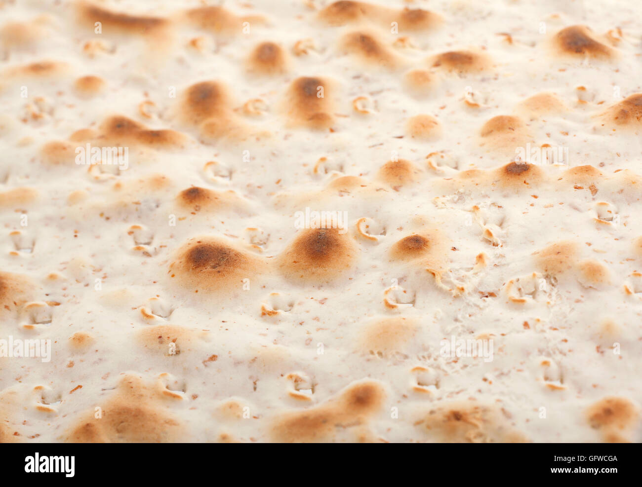 Matzo traditional jewish bread closeup background Stock Photo - Alamy