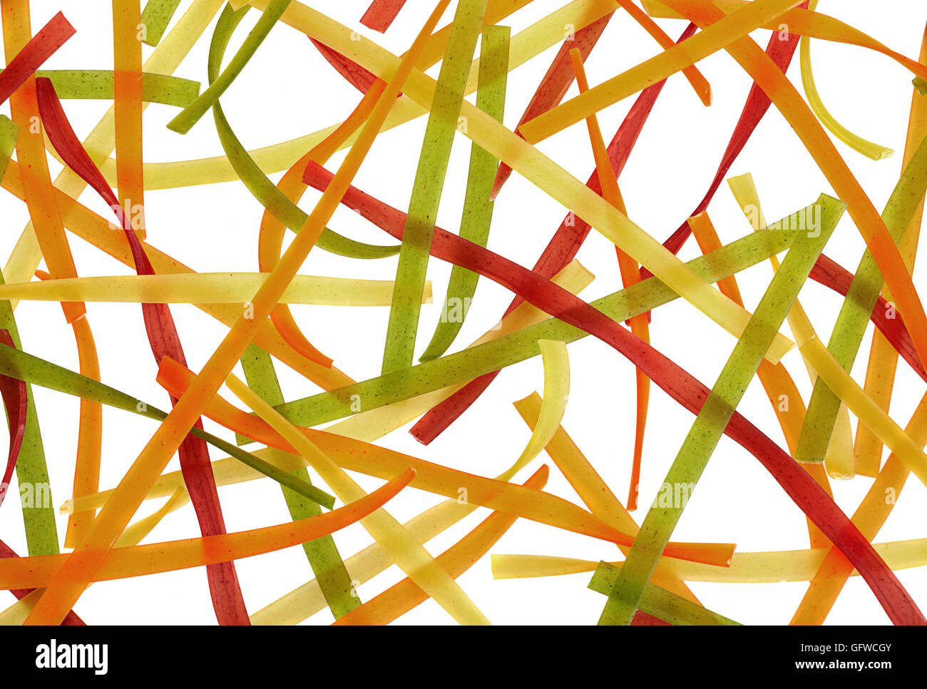 Wheat multicolored noodles isolated on white background Stock Photo - Alamy