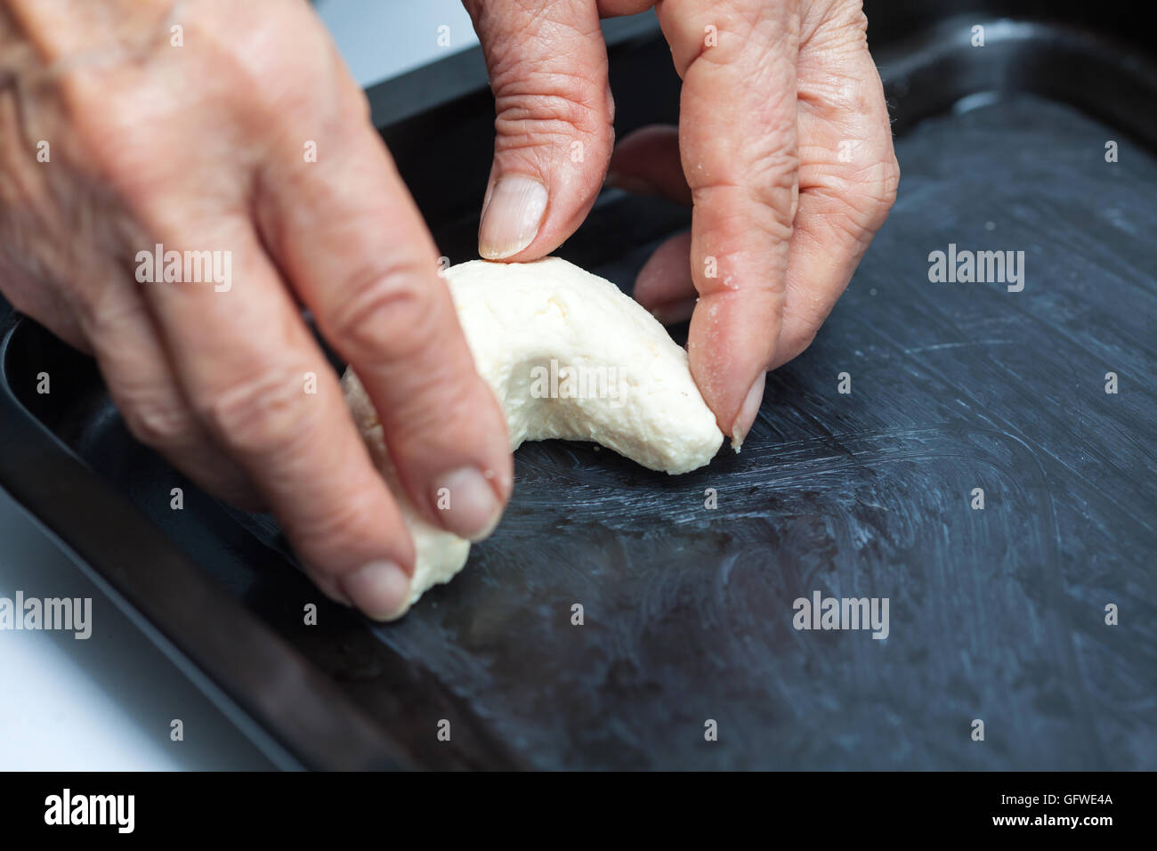 Placing colombian cassava bread (Pandeyuca) on baking sheet Stock Photo ...