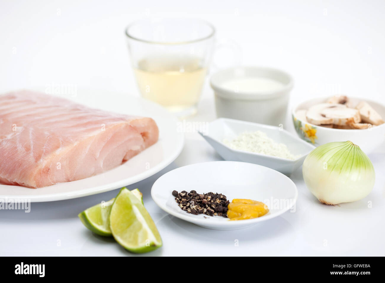 Ingredients to prepare a sea bass fillet Stock Photo - Alamy