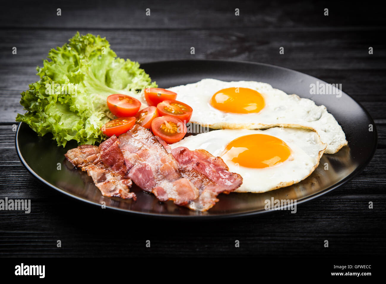 Traditional breakfast on a plate Stock Photo - Alamy