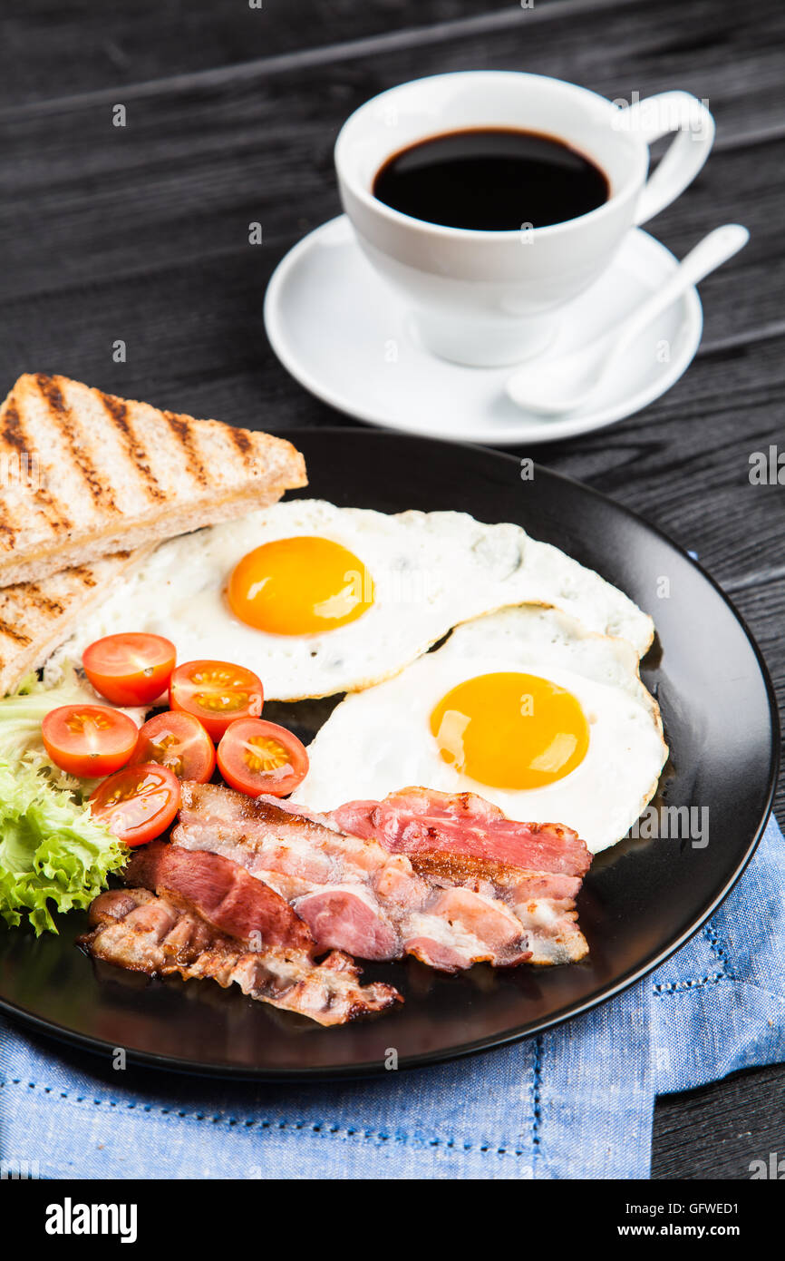 Traditional breakfast on a plate Stock Photo - Alamy