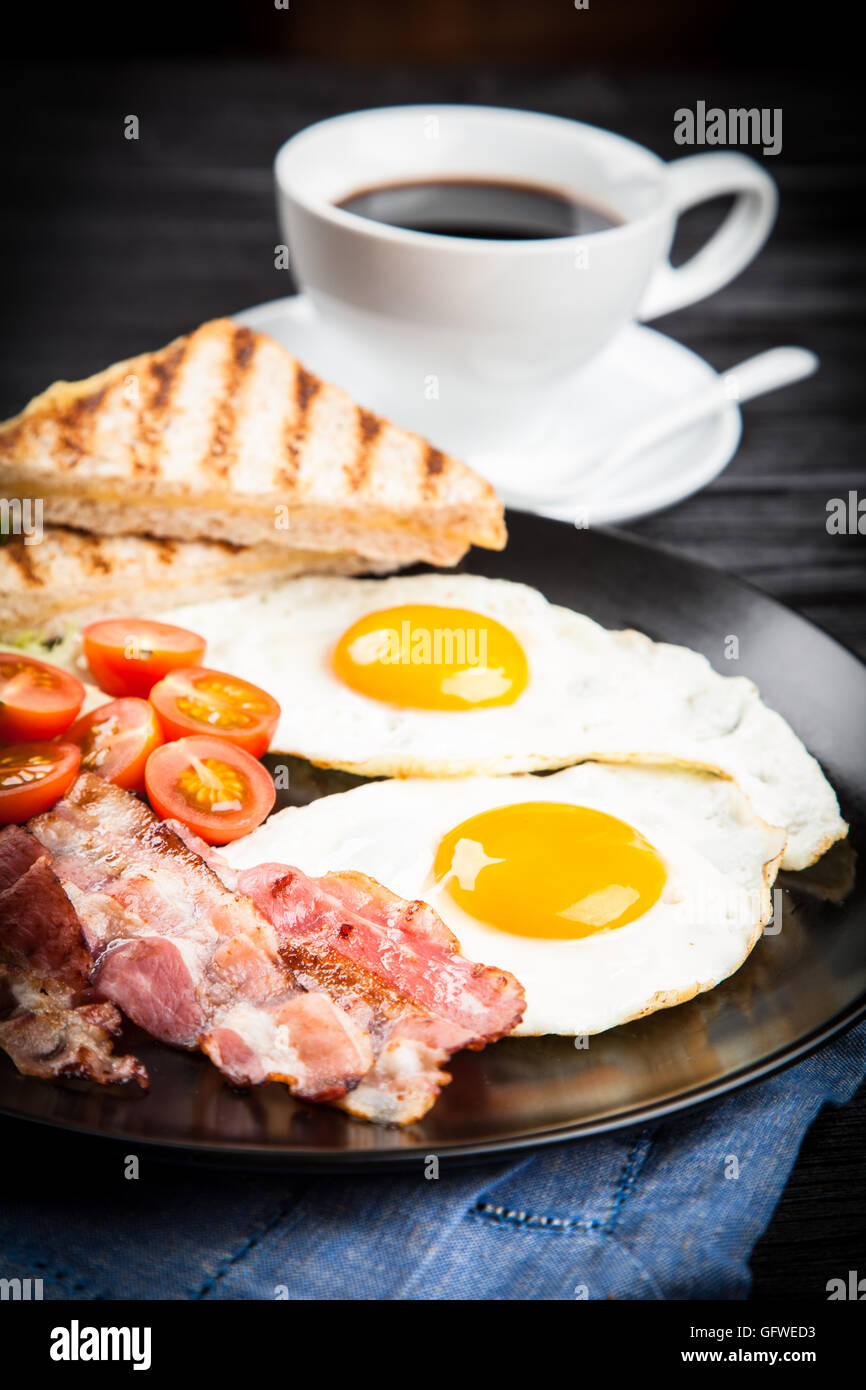 Traditional breakfast on a plate Stock Photo - Alamy