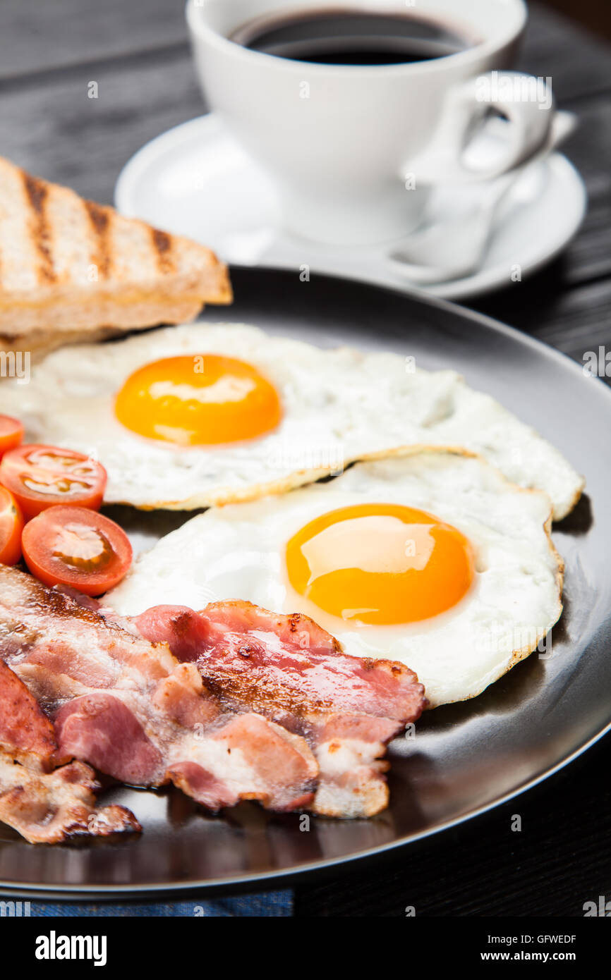 Traditional breakfast on a plate Stock Photo - Alamy