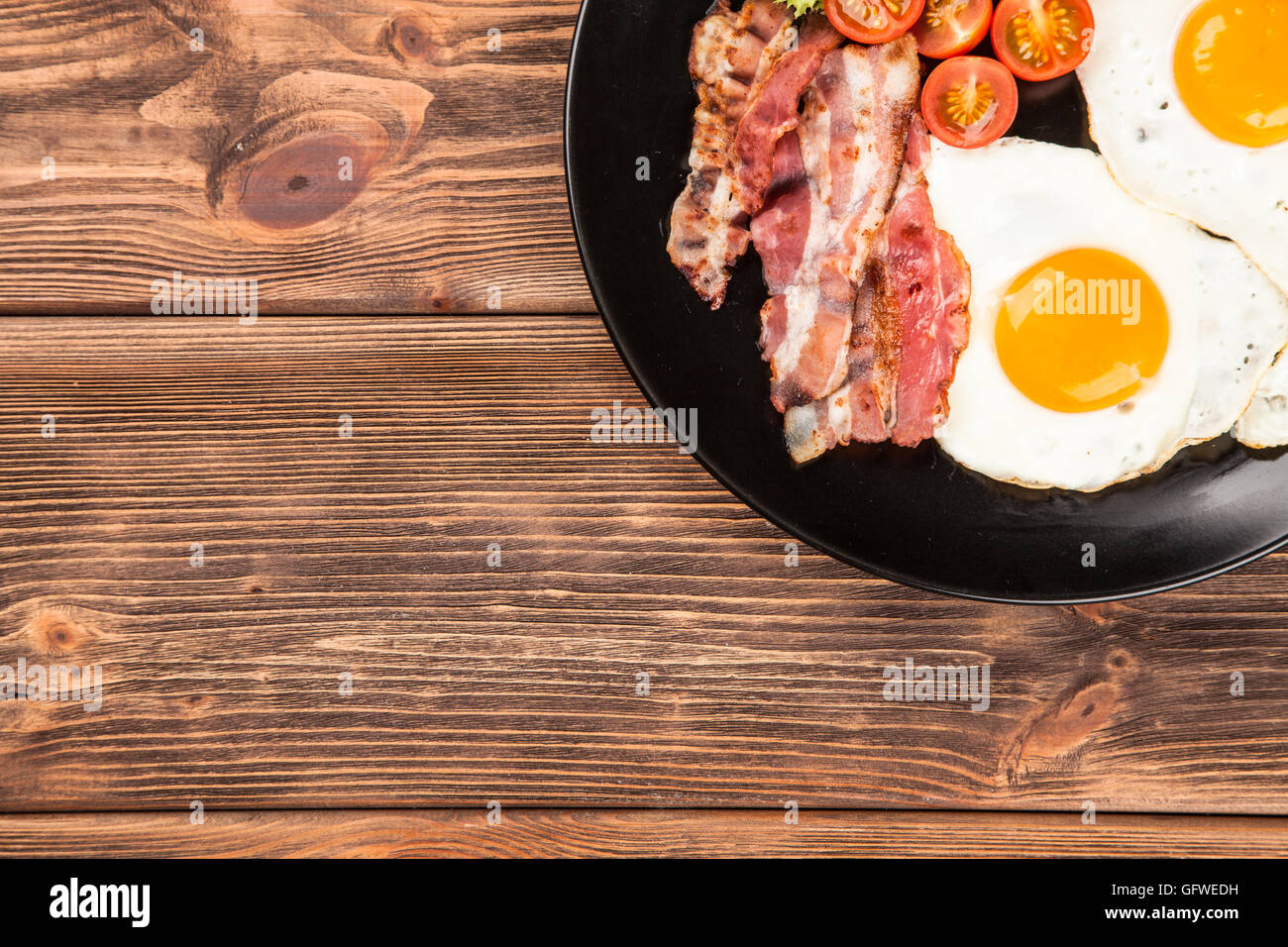 Traditional breakfast on a plate Stock Photo - Alamy