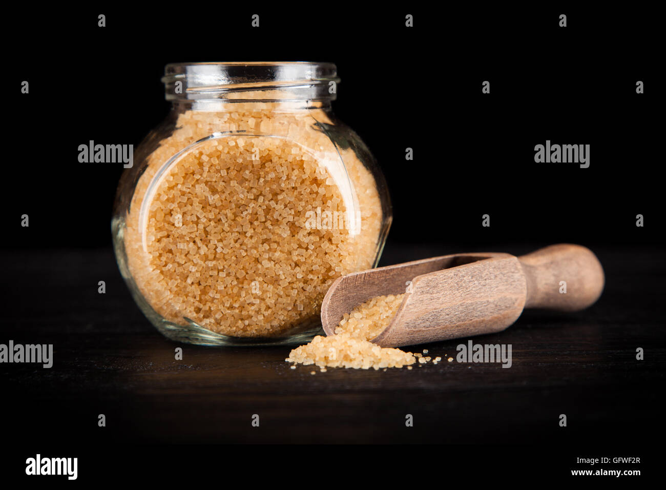 Brown unrefined sugar Stock Photo - Alamy
