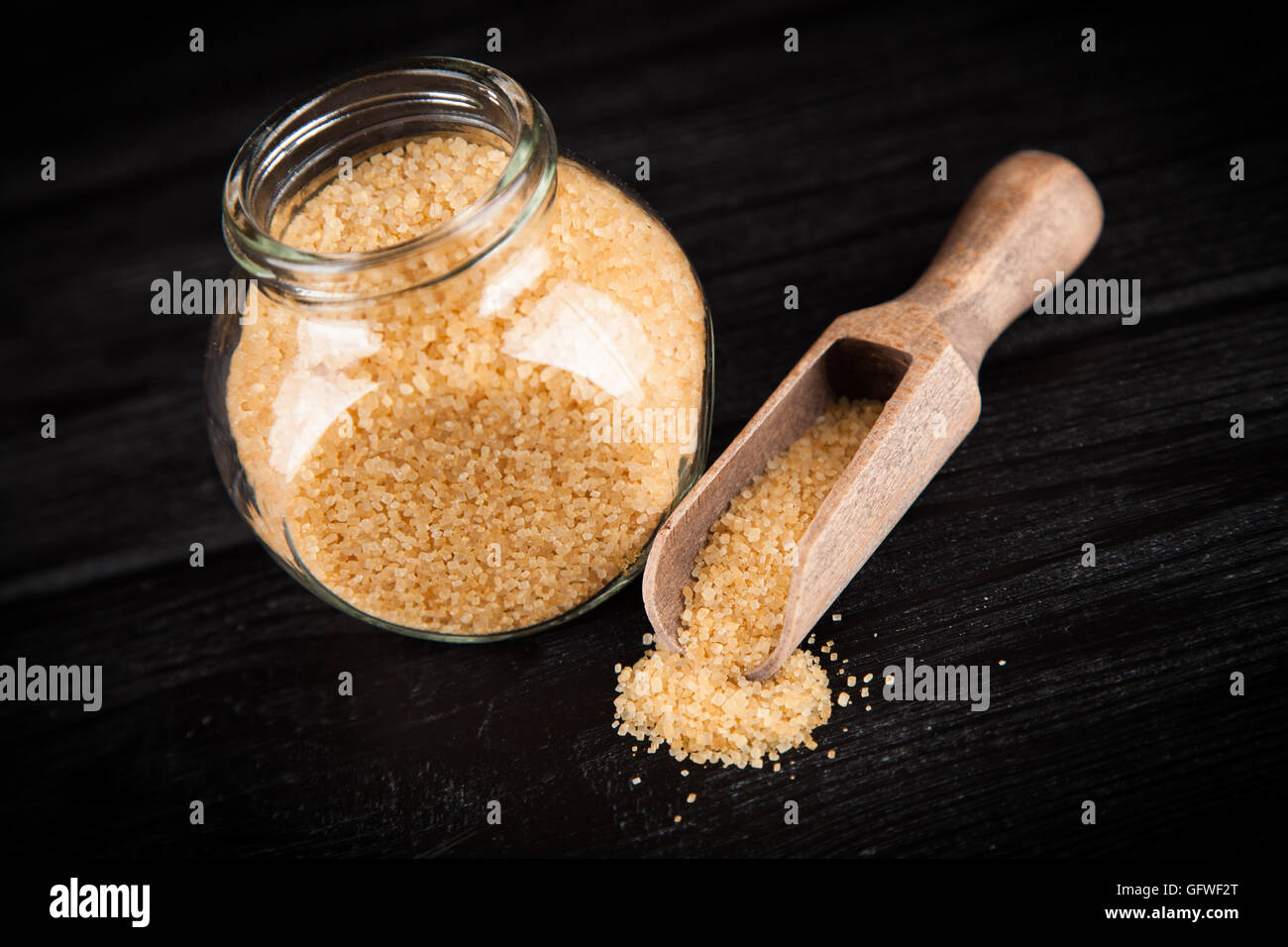 Brown unrefined sugar Stock Photo - Alamy