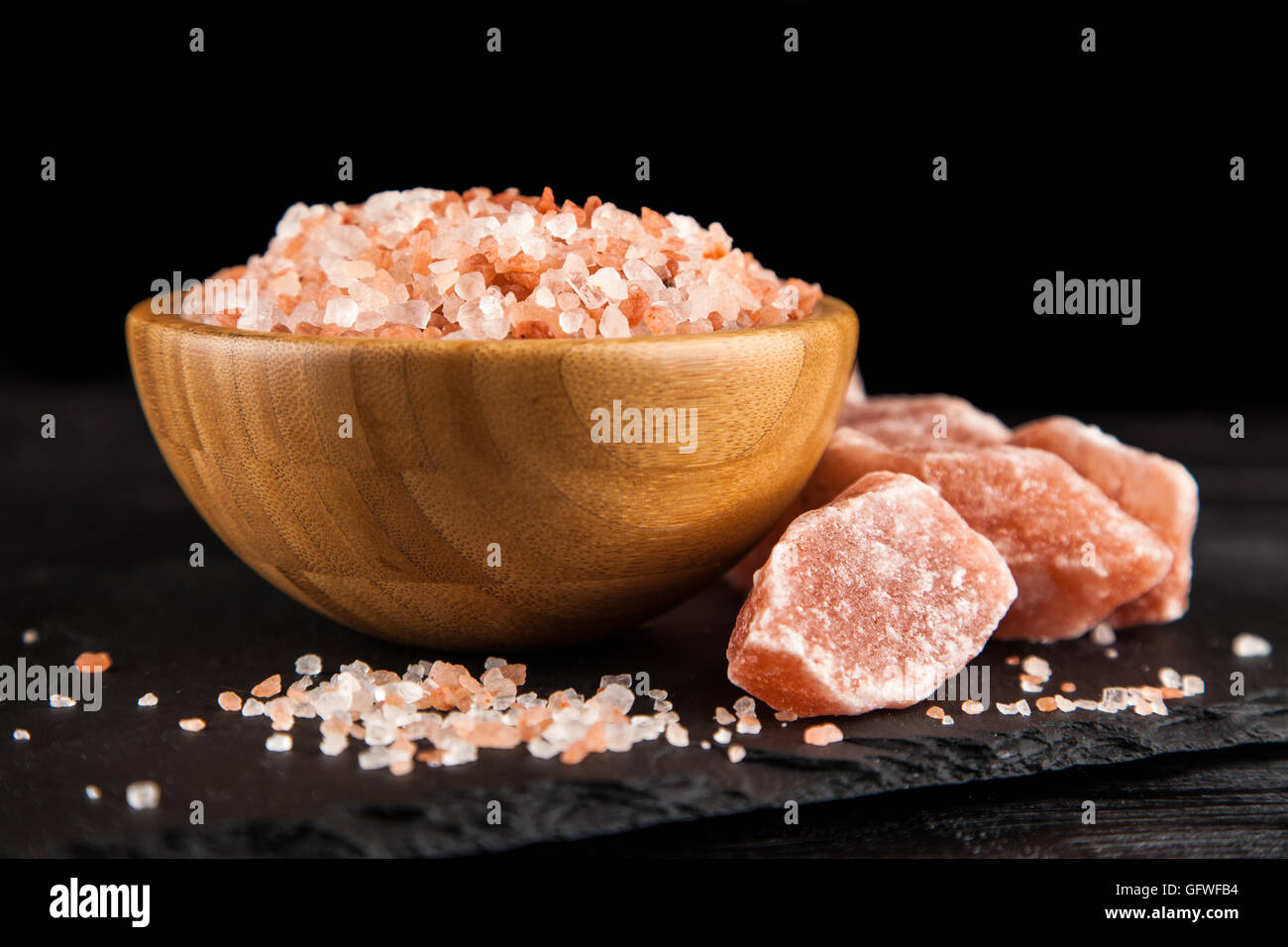 Salt in a bamboo bowl Stock Photo - Alamy