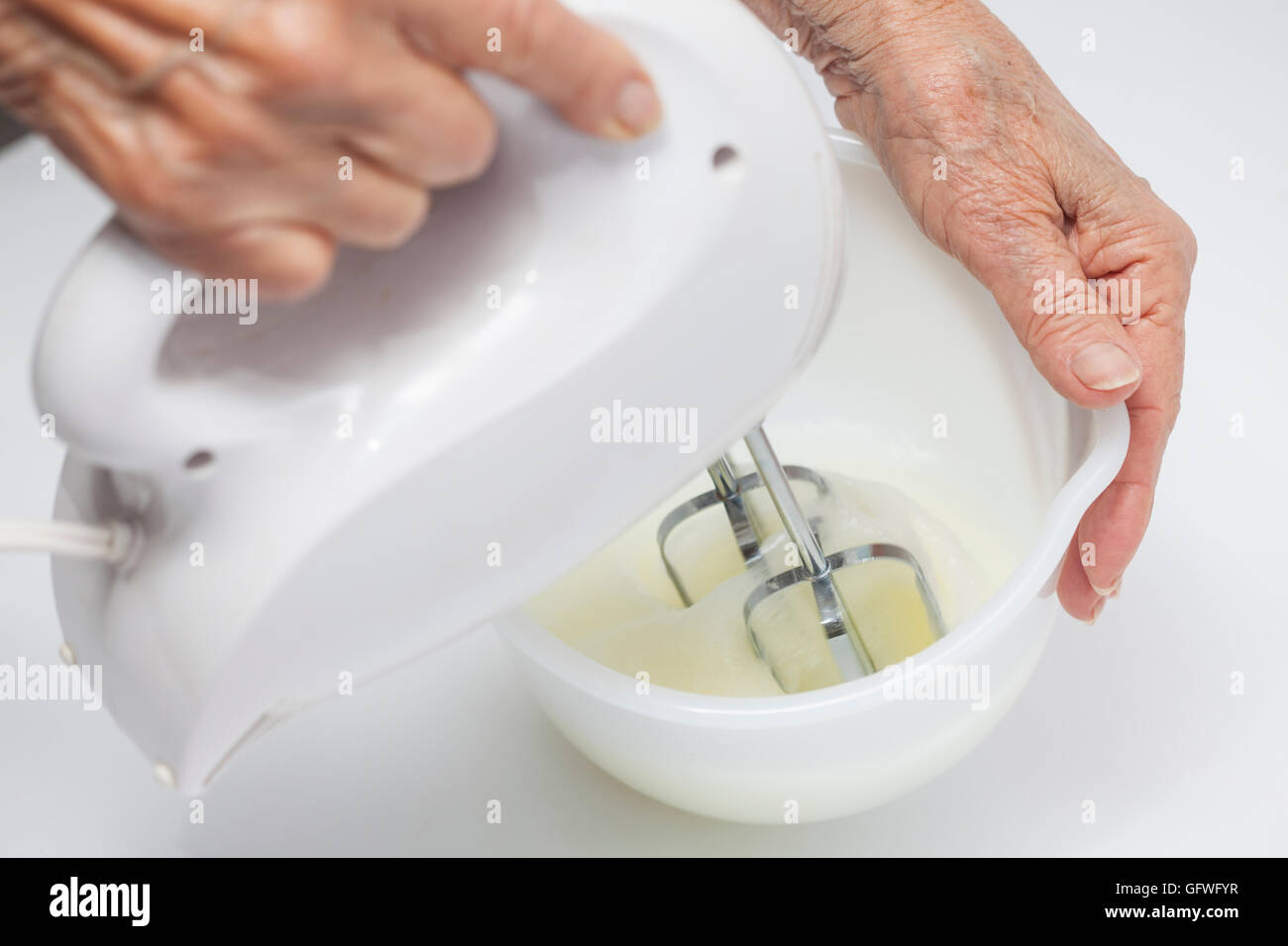 Whisking egg whites snow Stock Photo - Alamy