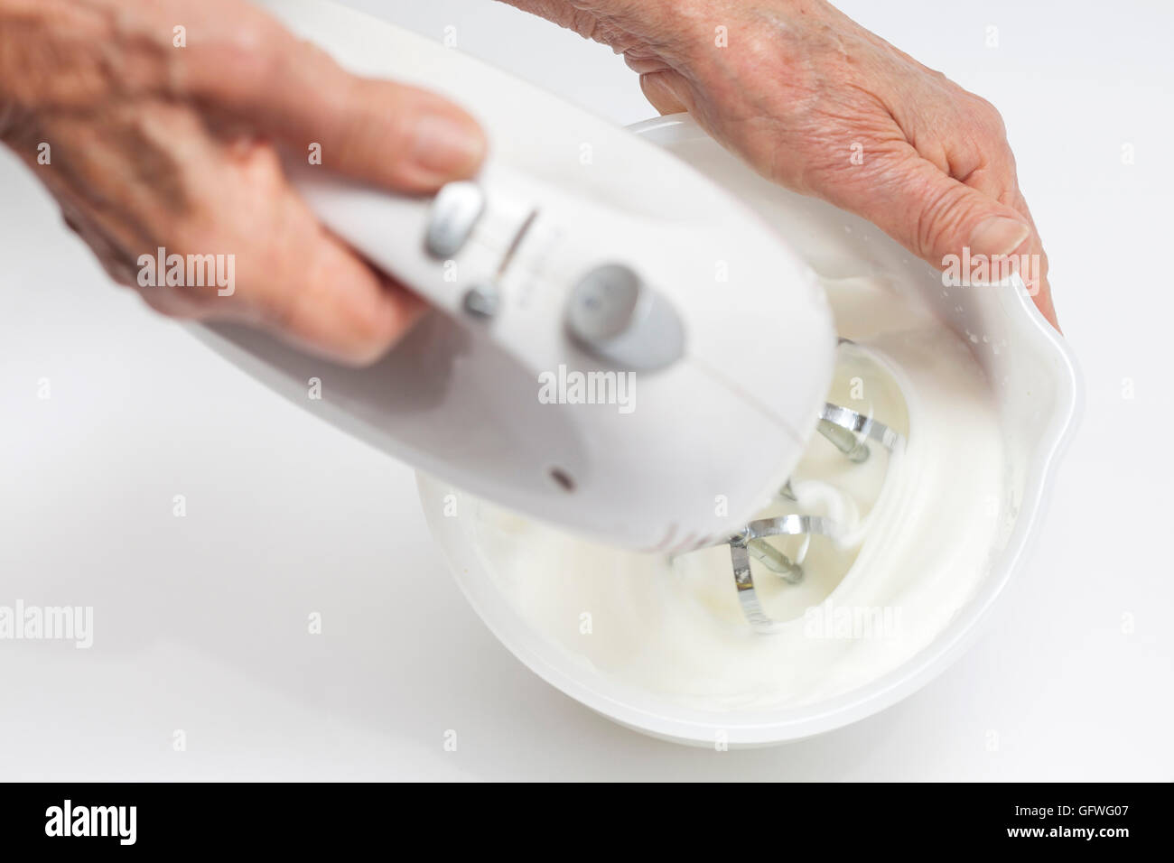 Woman beating egg whites hi-res stock photography and images - Alamy