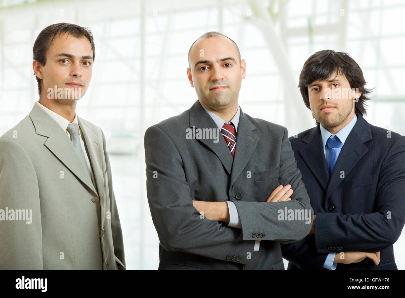 three business men at the office Stock Photo - Alamy