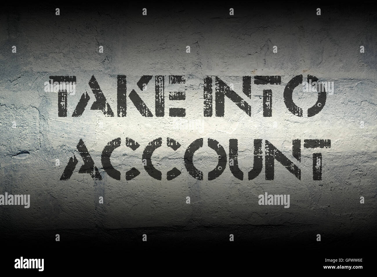 take into account stencil print on the grunge white brick wall Stock ...