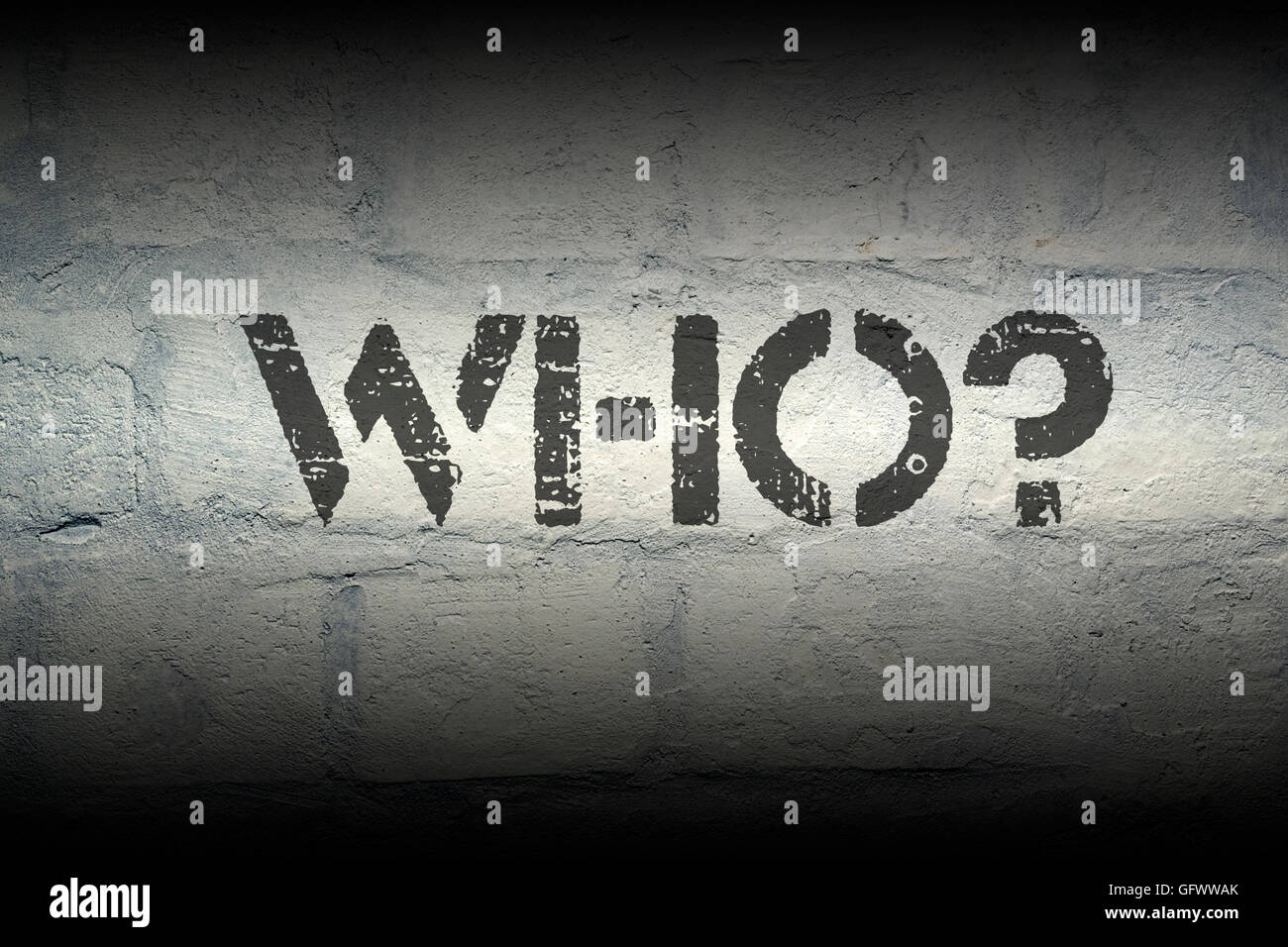 who question stencil print on the grunge white brick wall Stock Photo ...