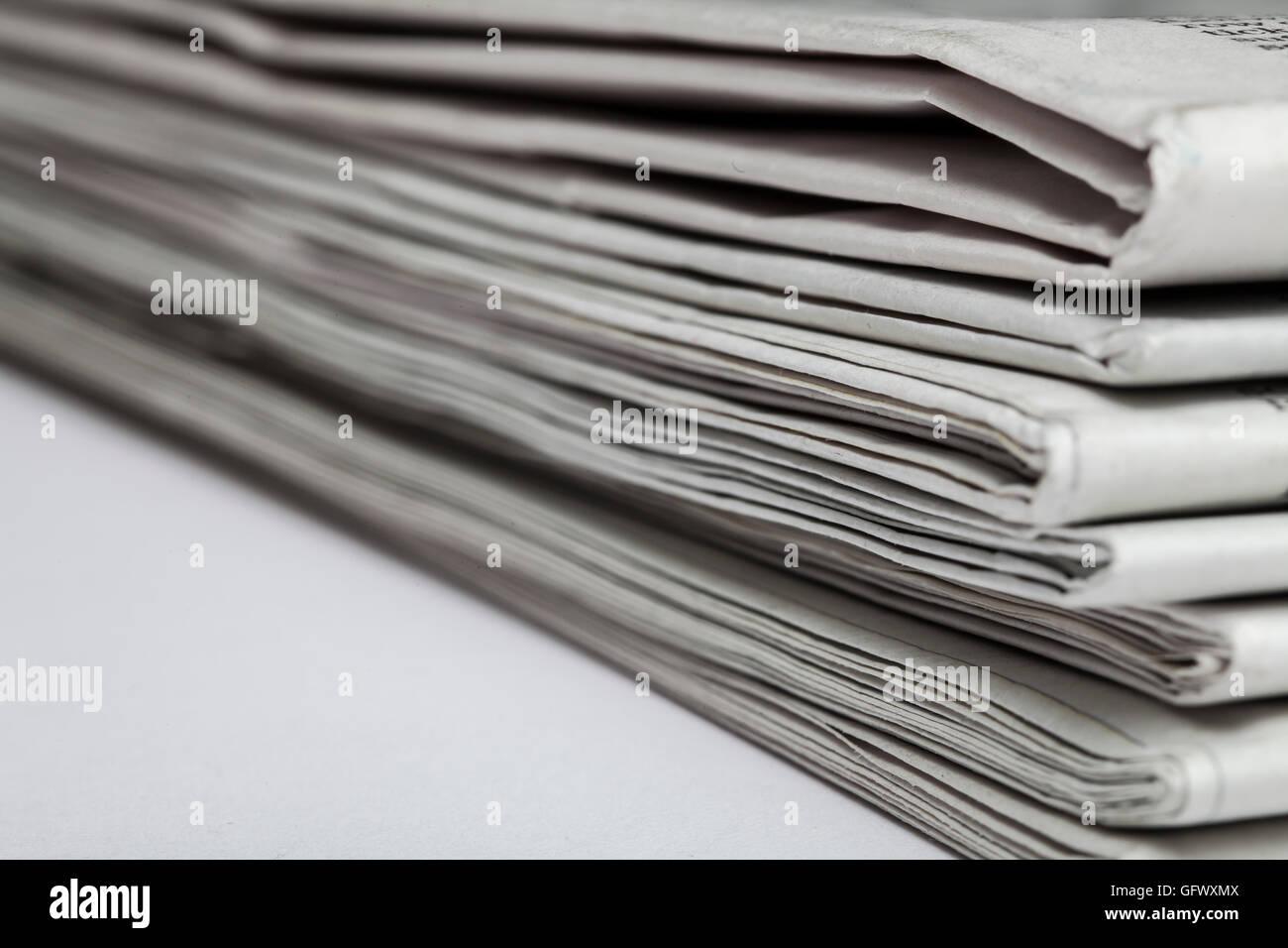 Stack of newspapers Stock Photo - Alamy