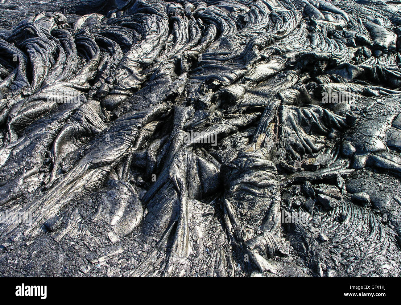 Lava has frozen into a shape like taffy on a cooling table Stock Photo ...