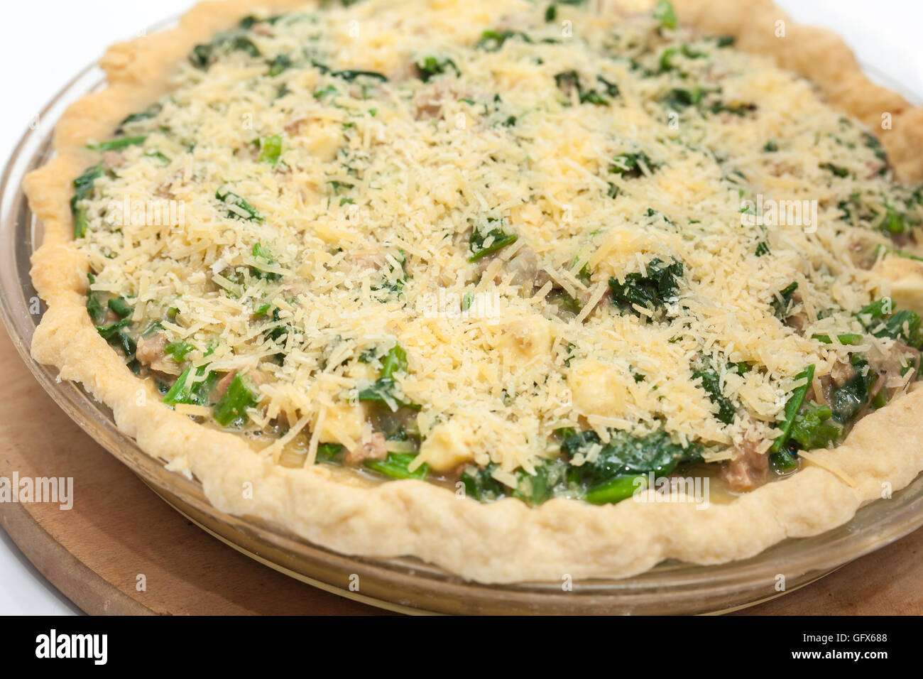 Spinach and tuna quiche lorraine ready to be baked Stock Photo - Alamy