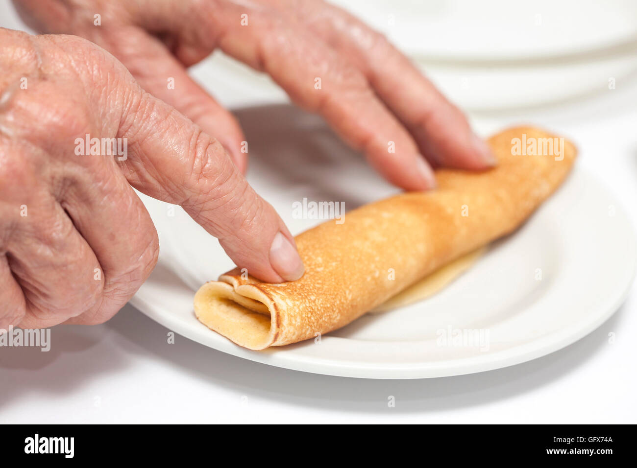 Rolling crepes hi-res stock photography and images - Alamy