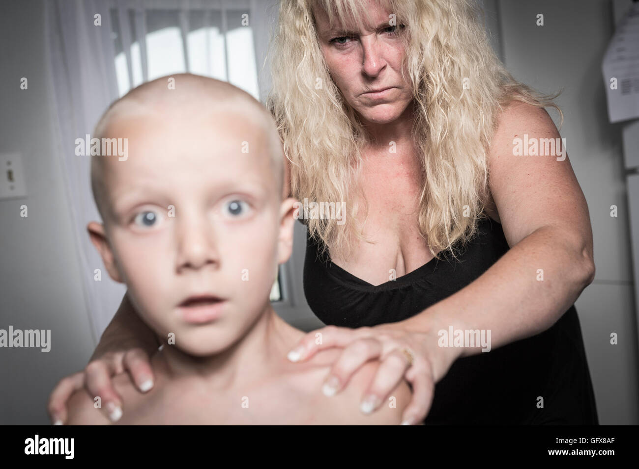 Mother unhappy at home Stock Photo - Alamy