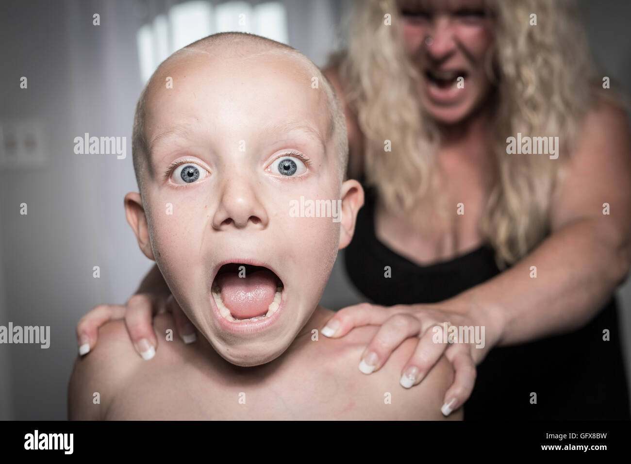 Mother unhappy at home Stock Photo - Alamy