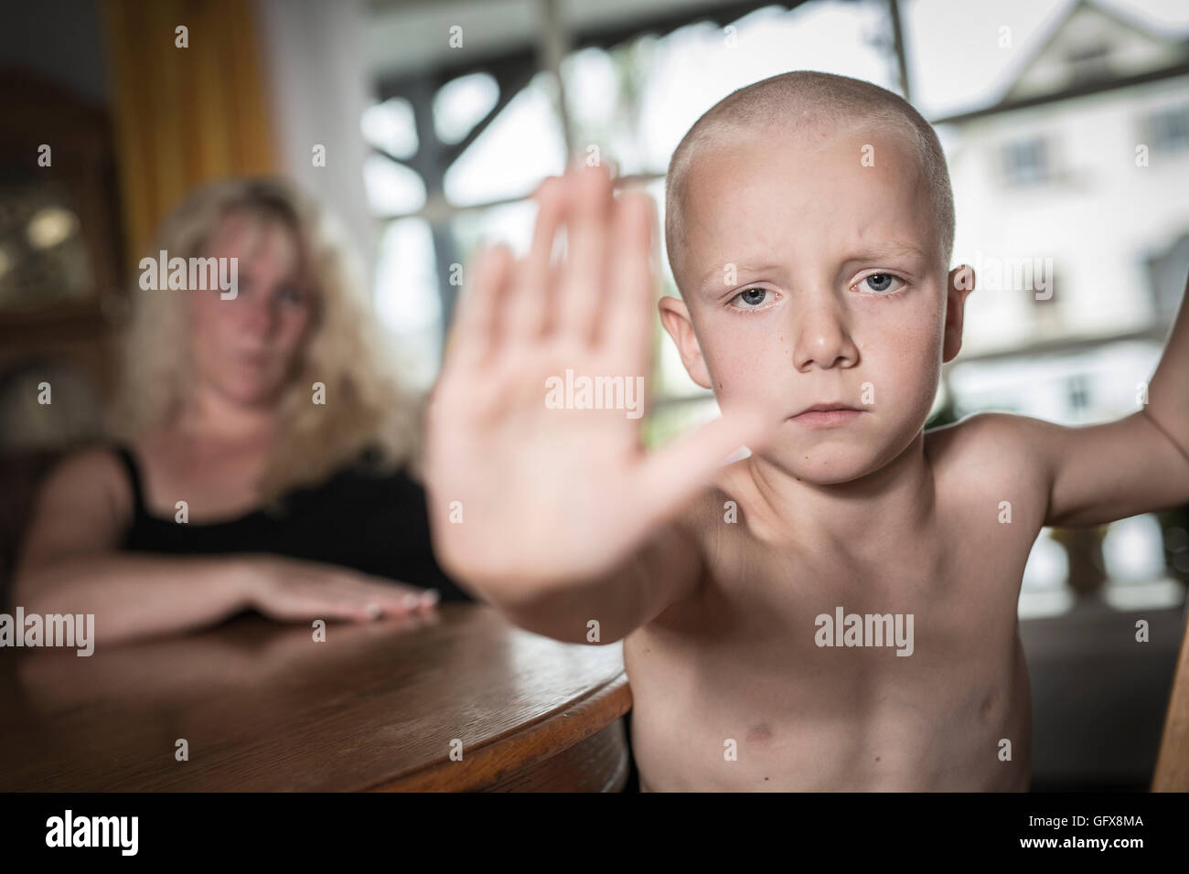 sad face kid and hand raise to stop or protect Stock Photo - Alamy