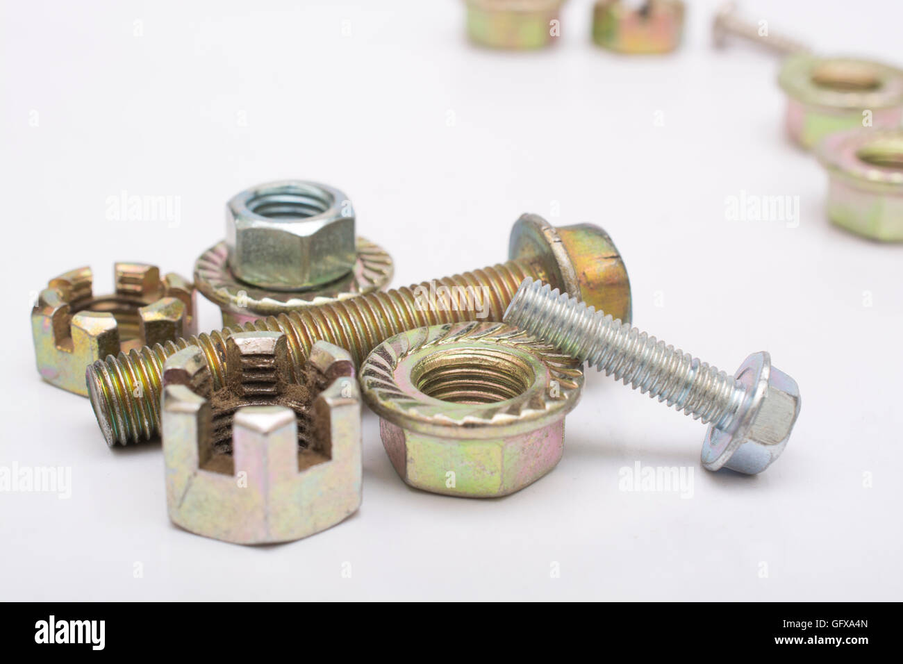 Different Nuts and Bolts hardware Isolated on White Stock Photo - Alamy