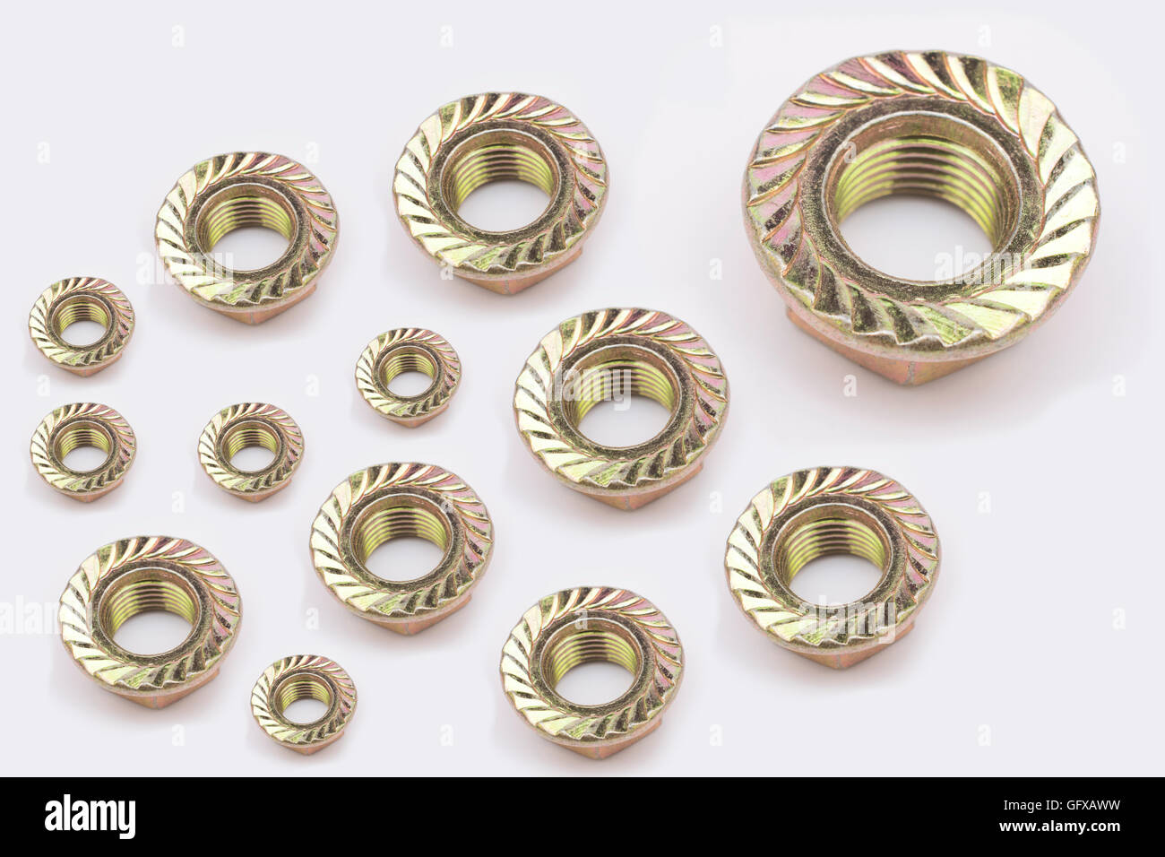 One Big Bolt with other smaller bolts isolated on white Stock Photo - Alamy