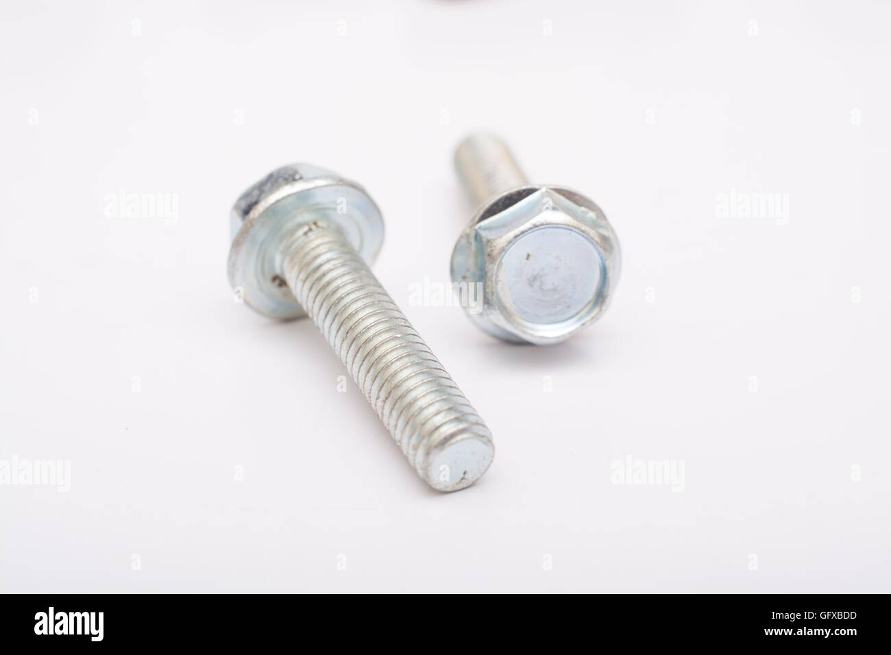 Isolated Bolts Nuts on white background Stock Photo - Alamy