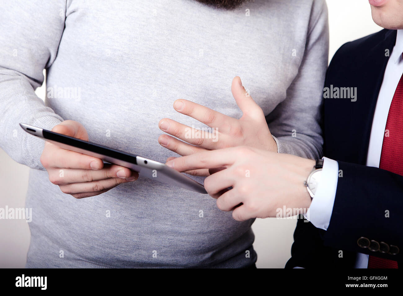 Business offer, partnership. Two partners signing a document. contract ...