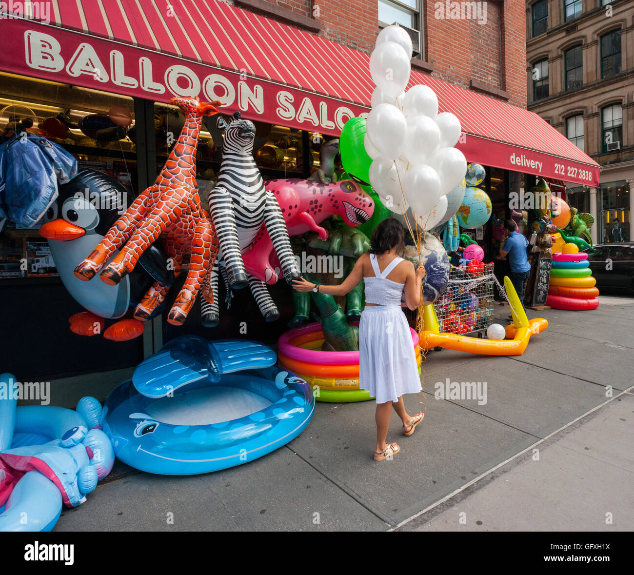 Party city store balloons hi-res stock photography and images - Alamy