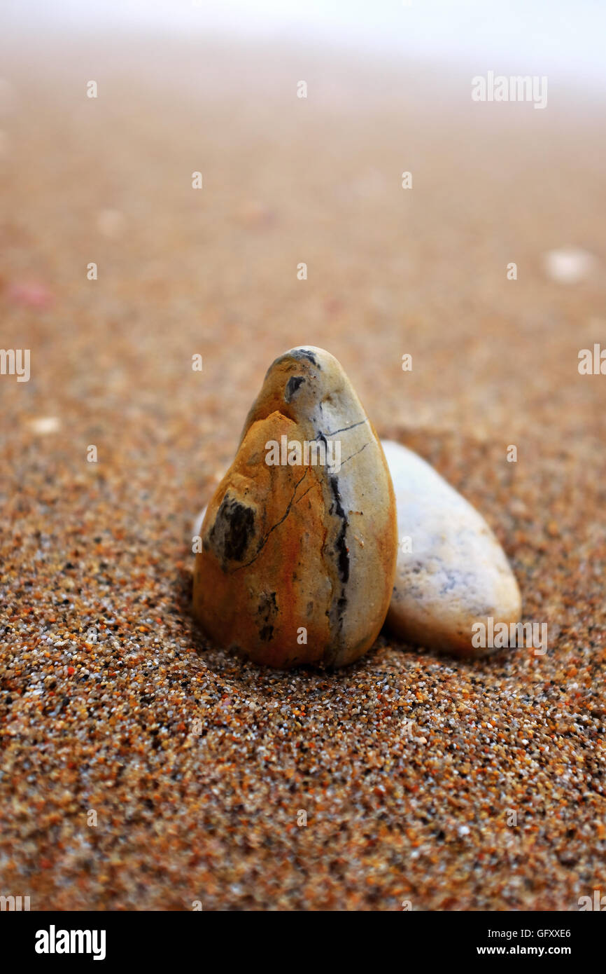 Pyramid made with wet pebble stones on the sea beach, Corfu Island ...