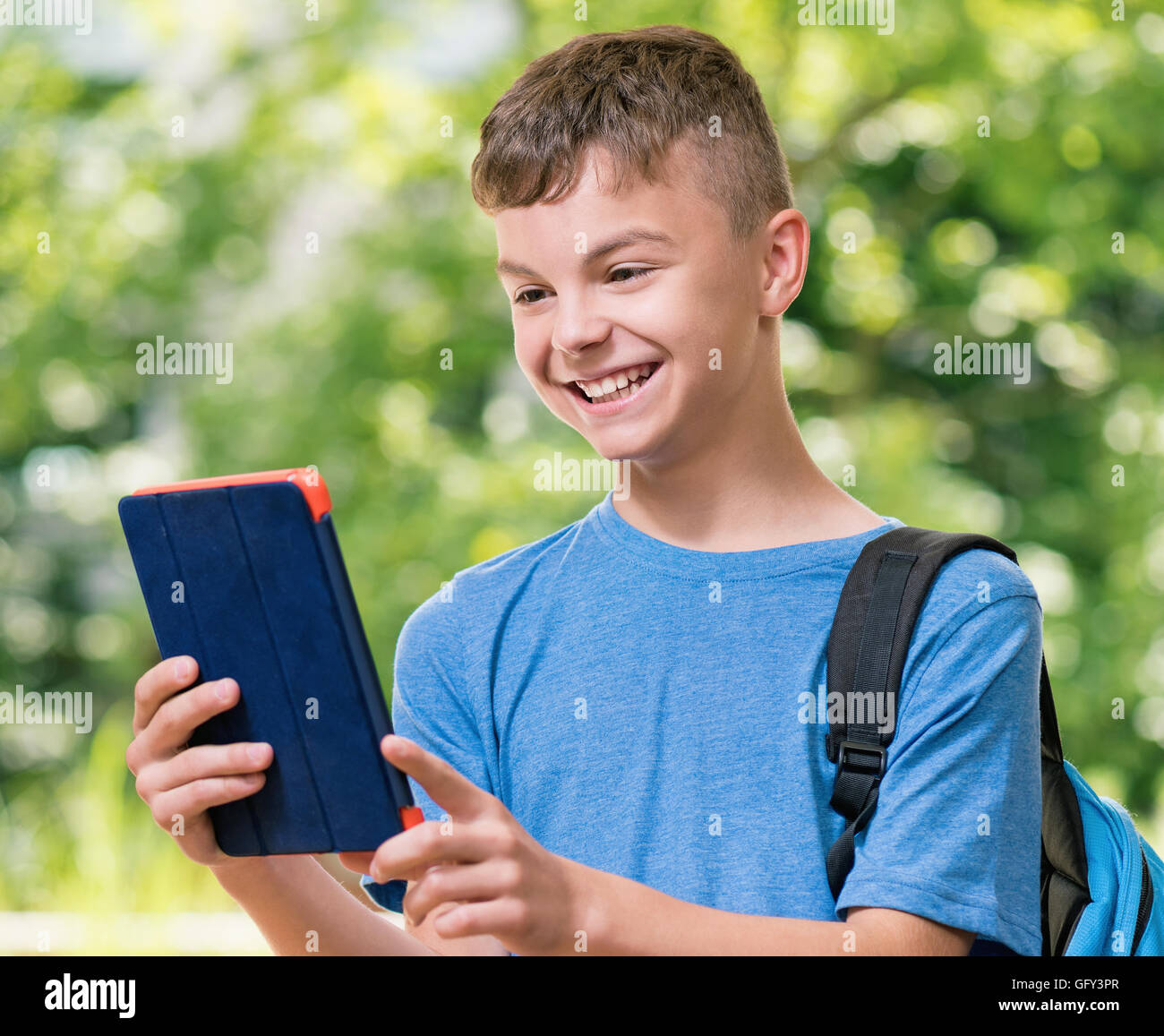 Boy with tablet Stock Photo - Alamy